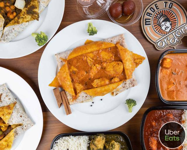 Order Butter Chicken Roti (King East) Restaurant Delivery【Menu & Prices ...