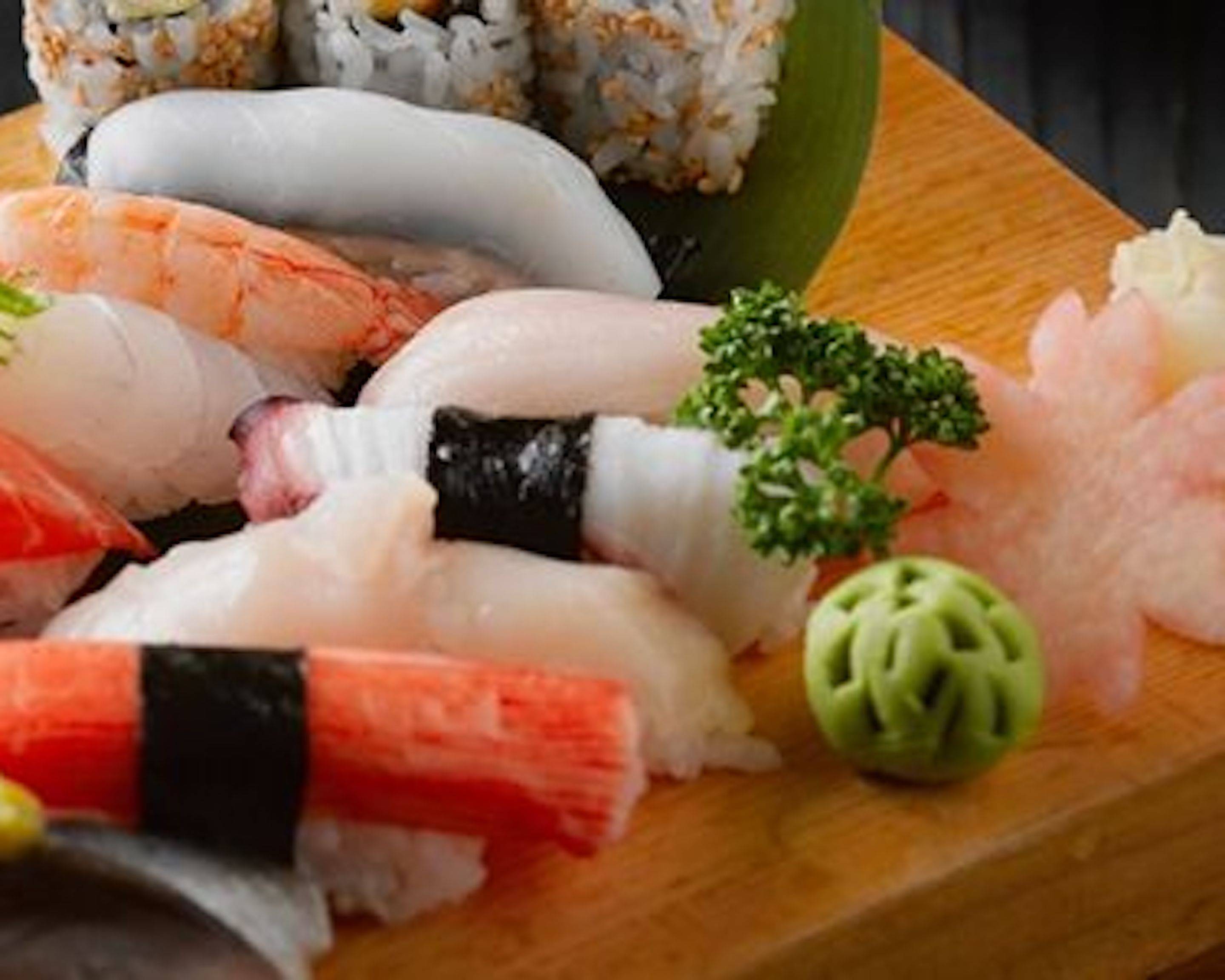 Order sushi man - Menu & Prices - Champaign Delivery | Uber Eats