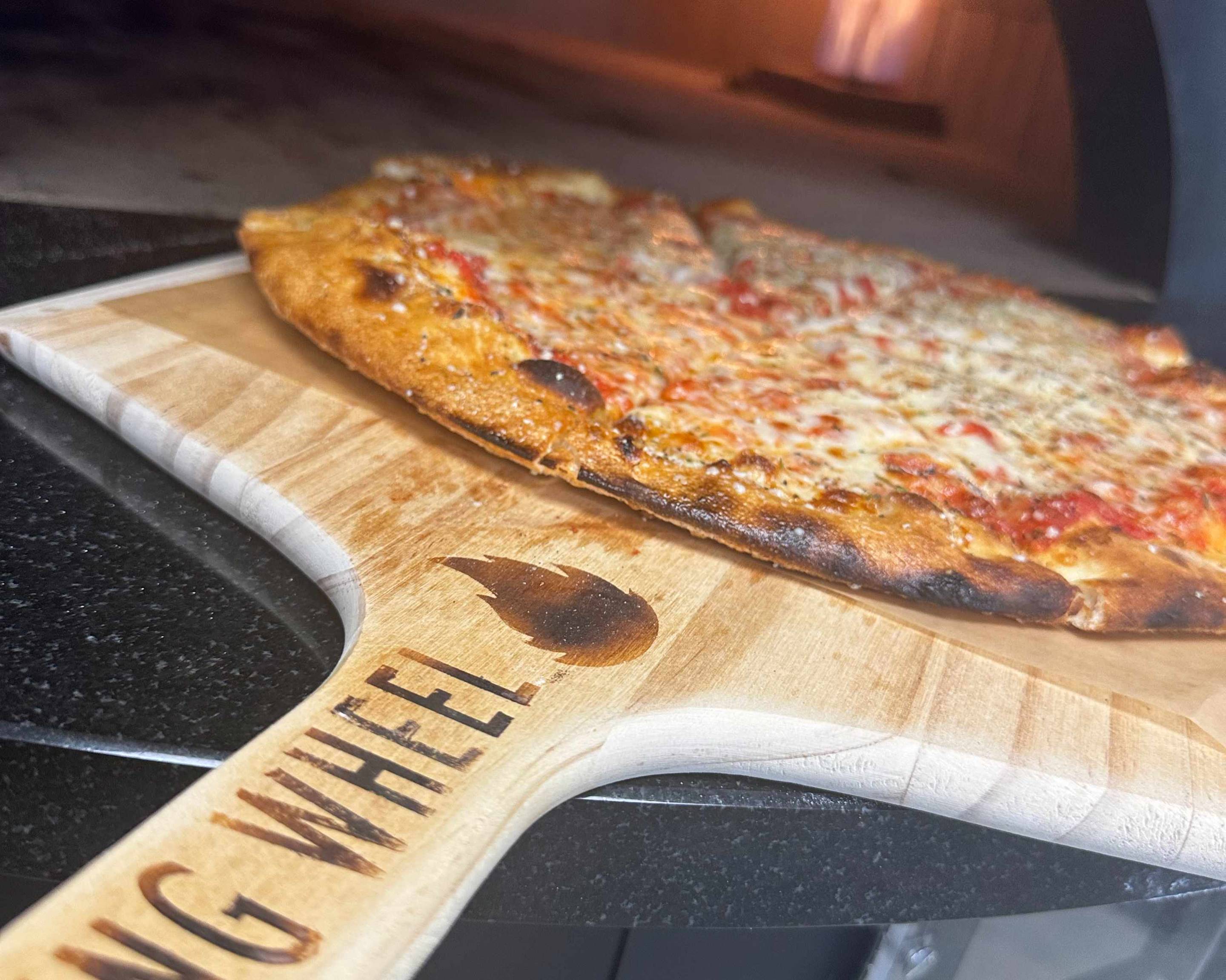 Order The Flaming Wheel Pizzeria Menu Delivery in Conroe | Menu ...
