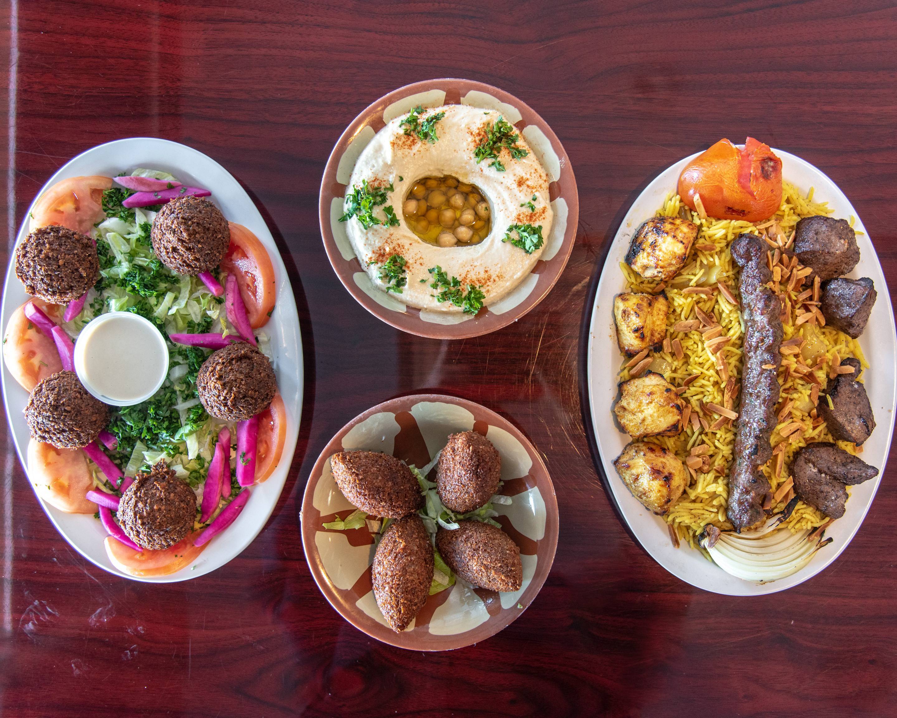 Order Raouche Cafe Delivery in Fairfax | Menu & Prices | Uber Eats