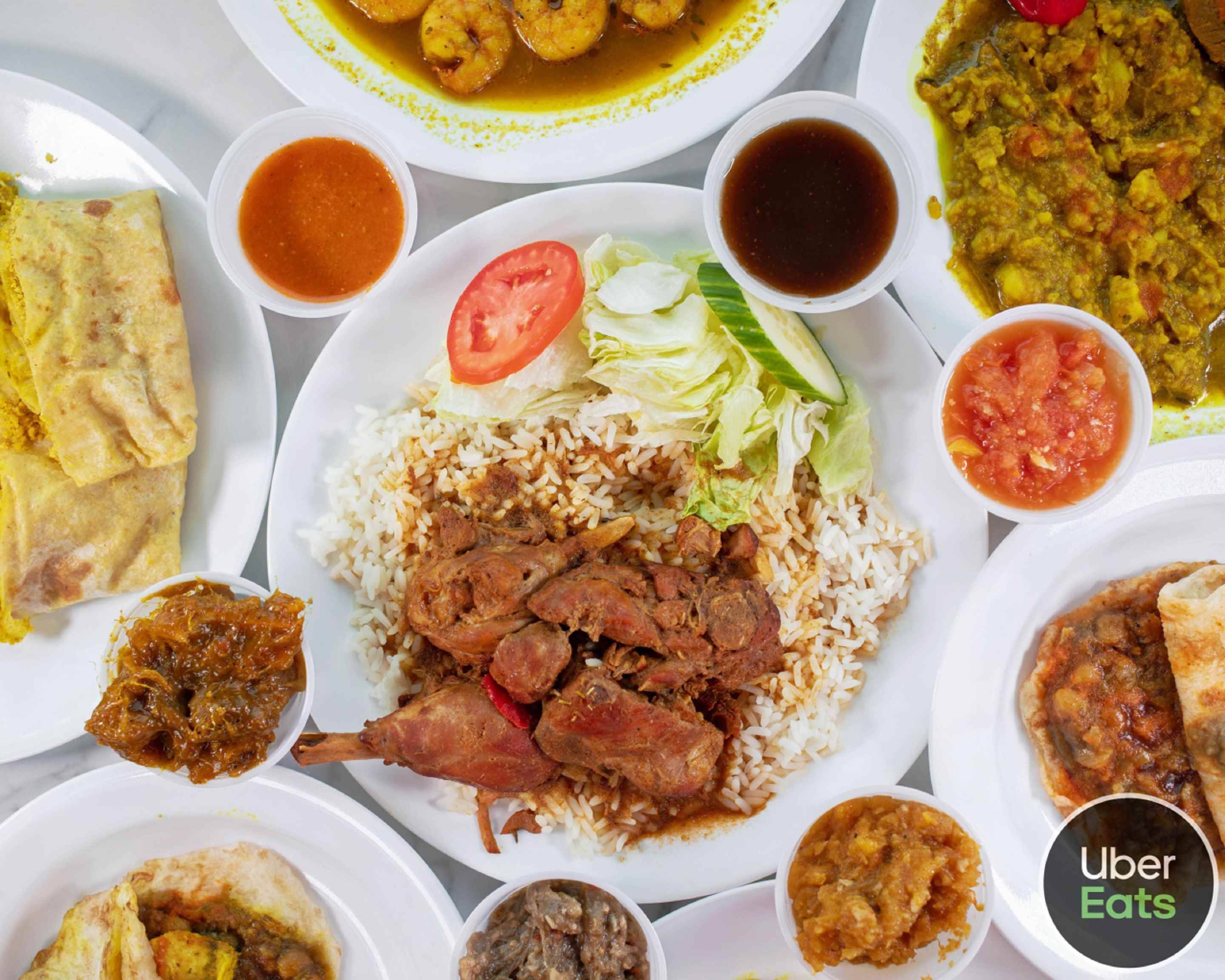 Order Madhu's Roti & Doubles - Menu & Prices - Waterloo Delivery | Uber ...