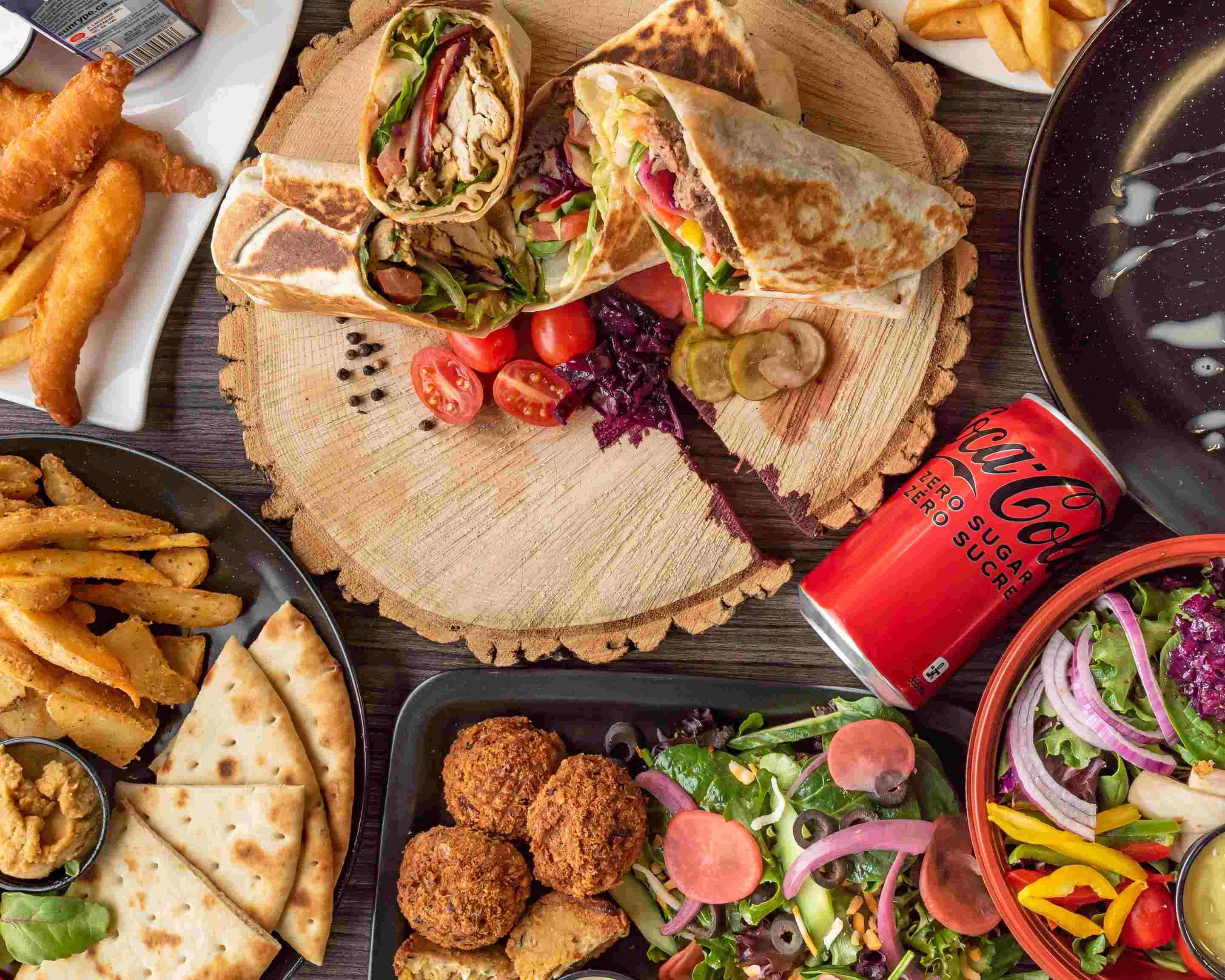 Order Shawarma Rebolusyon Delivery【Menu & Prices】| Calgary | Uber Eats
