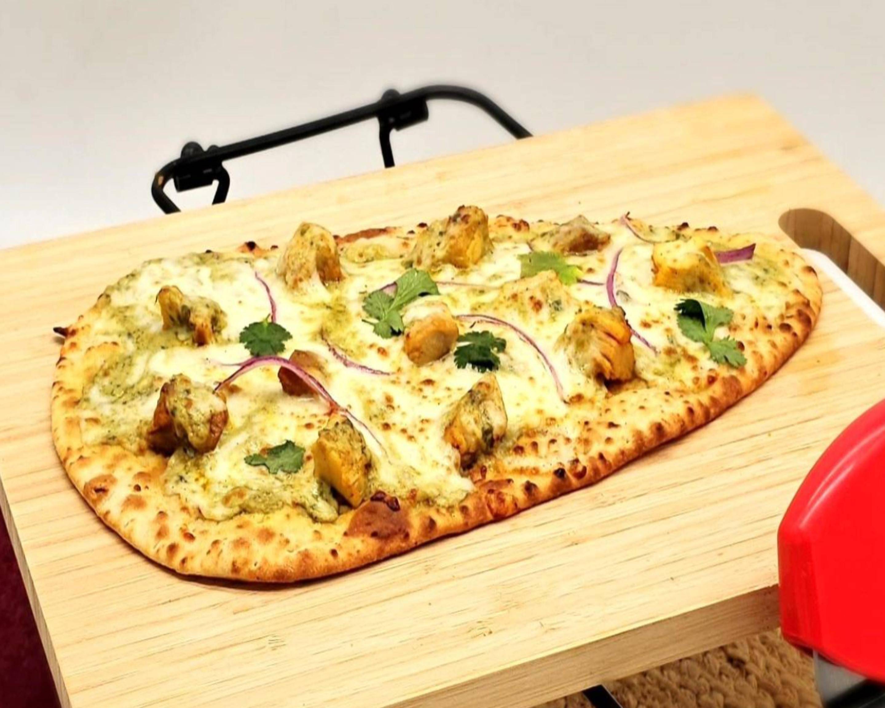 Naanza - Indian Style Pizza (Chicago) Menu Chicago • Order Naanza ...