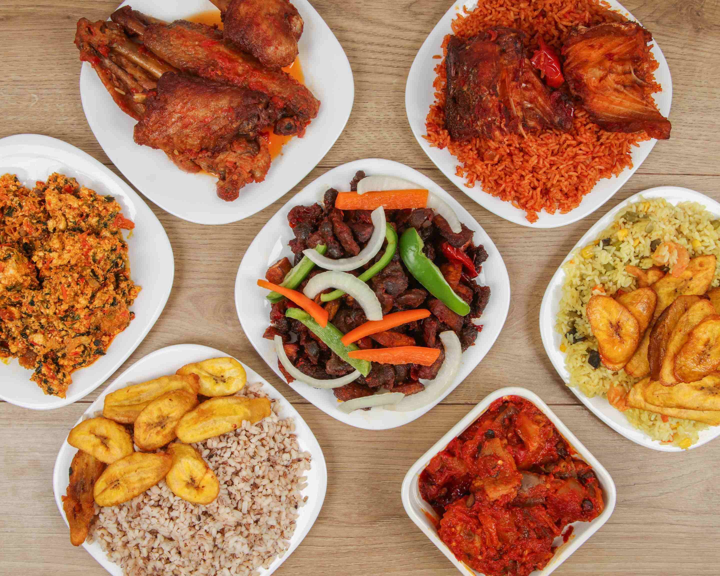 Order Henry Jollof Restaurant (1085 Fewster Dr) - Menu & Prices ...
