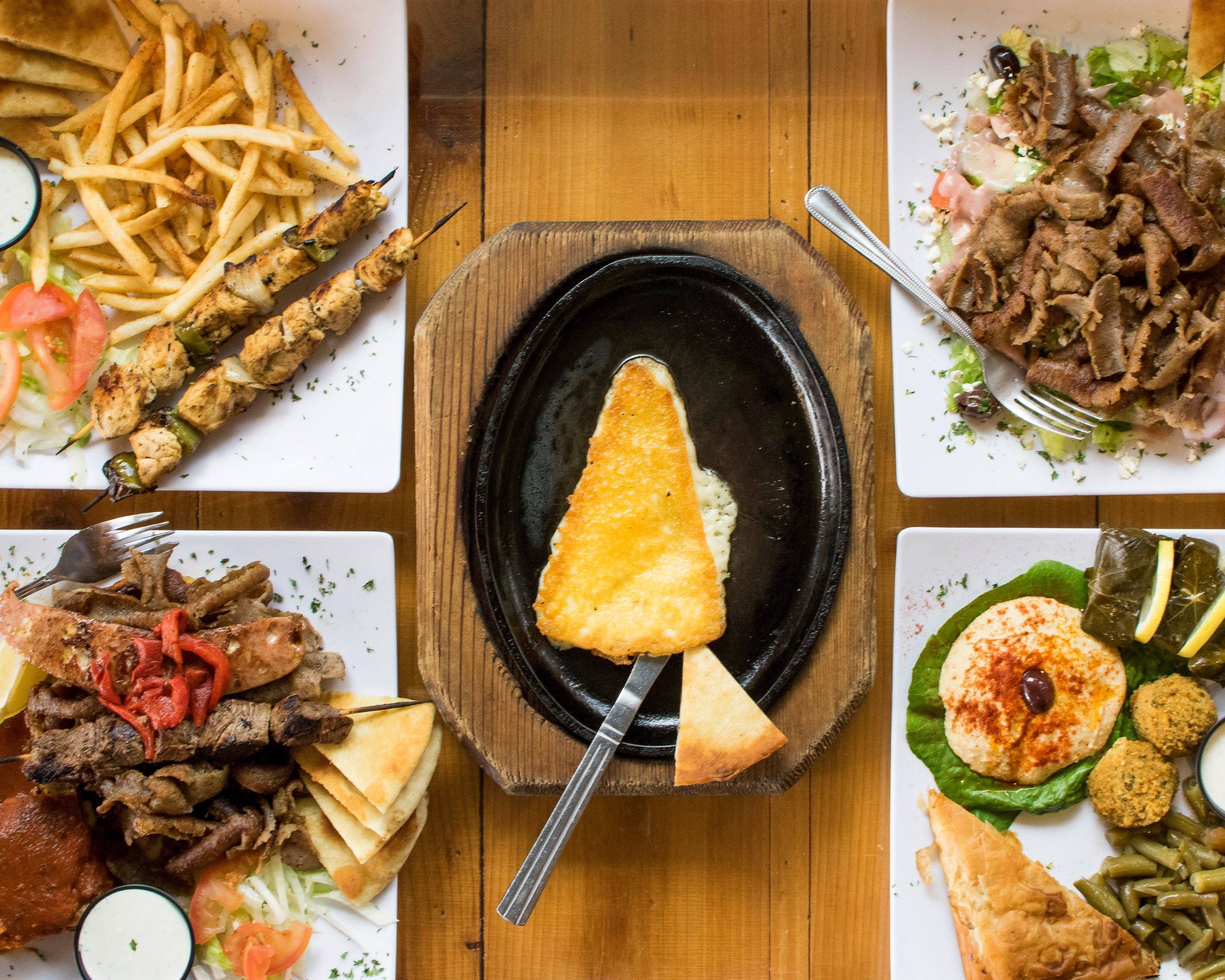 Flaming Cheese Saganaki Menu Dallas • Order Flaming Cheese Saganaki ...