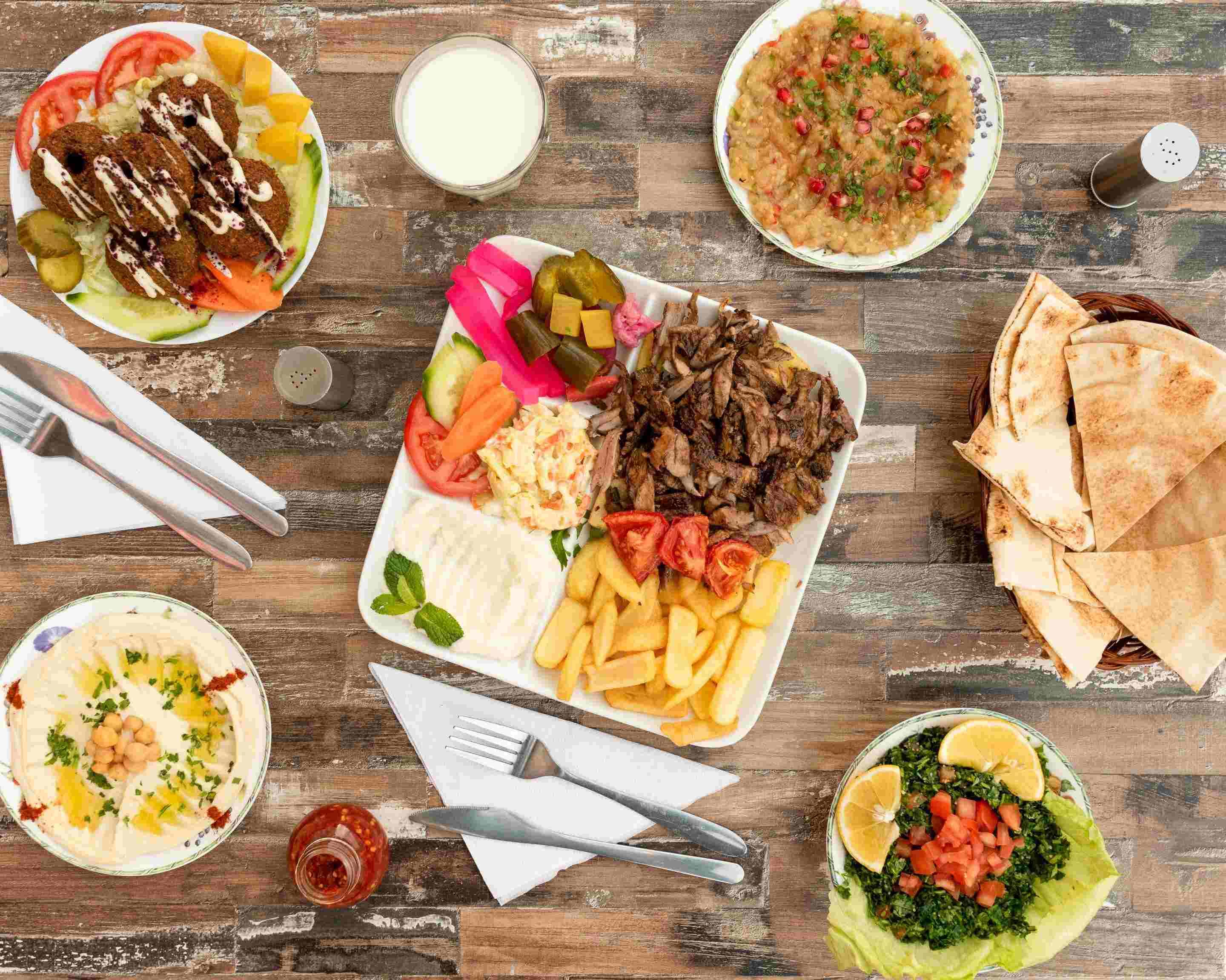 Bestellen bij Tarbush Restaurant in Amsterdam | Menu en prijzen | Uber Eats