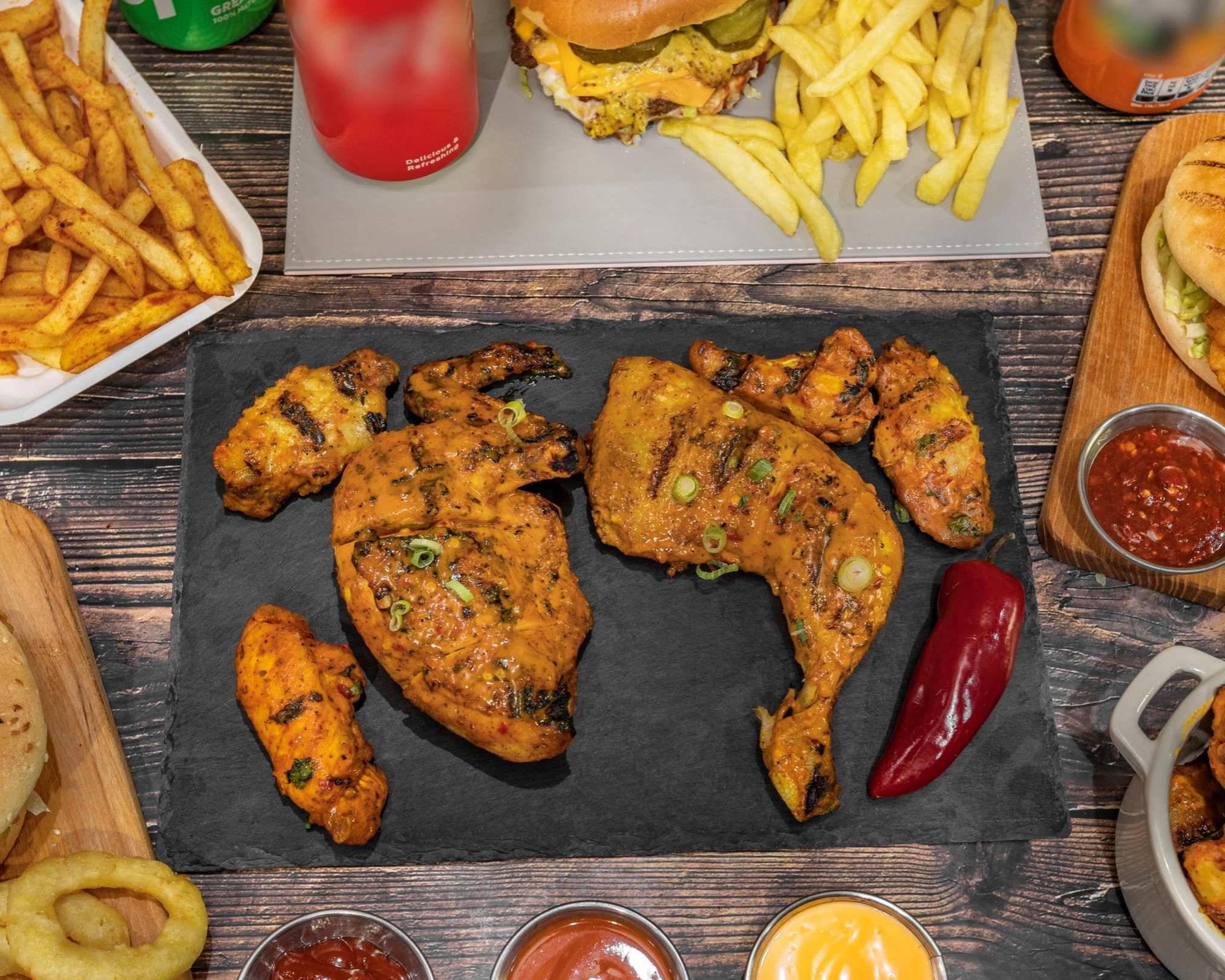 The Flaming Bird Menu & Prices - London Delivery - Order with Uber Eats