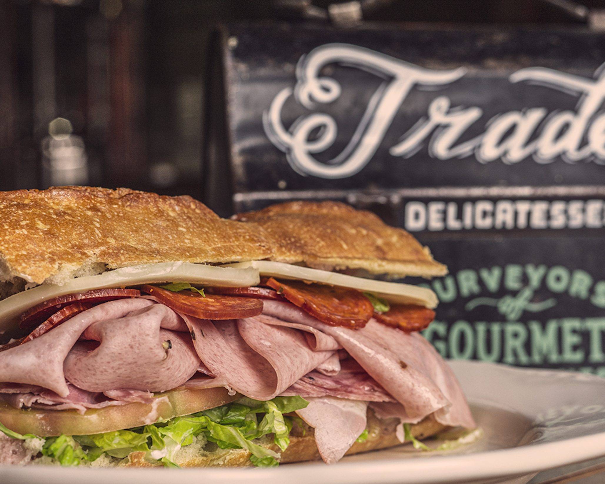 Order Trades Delicatessen Menu Delivery【Menu & Prices】| Dallas | Uber Eats