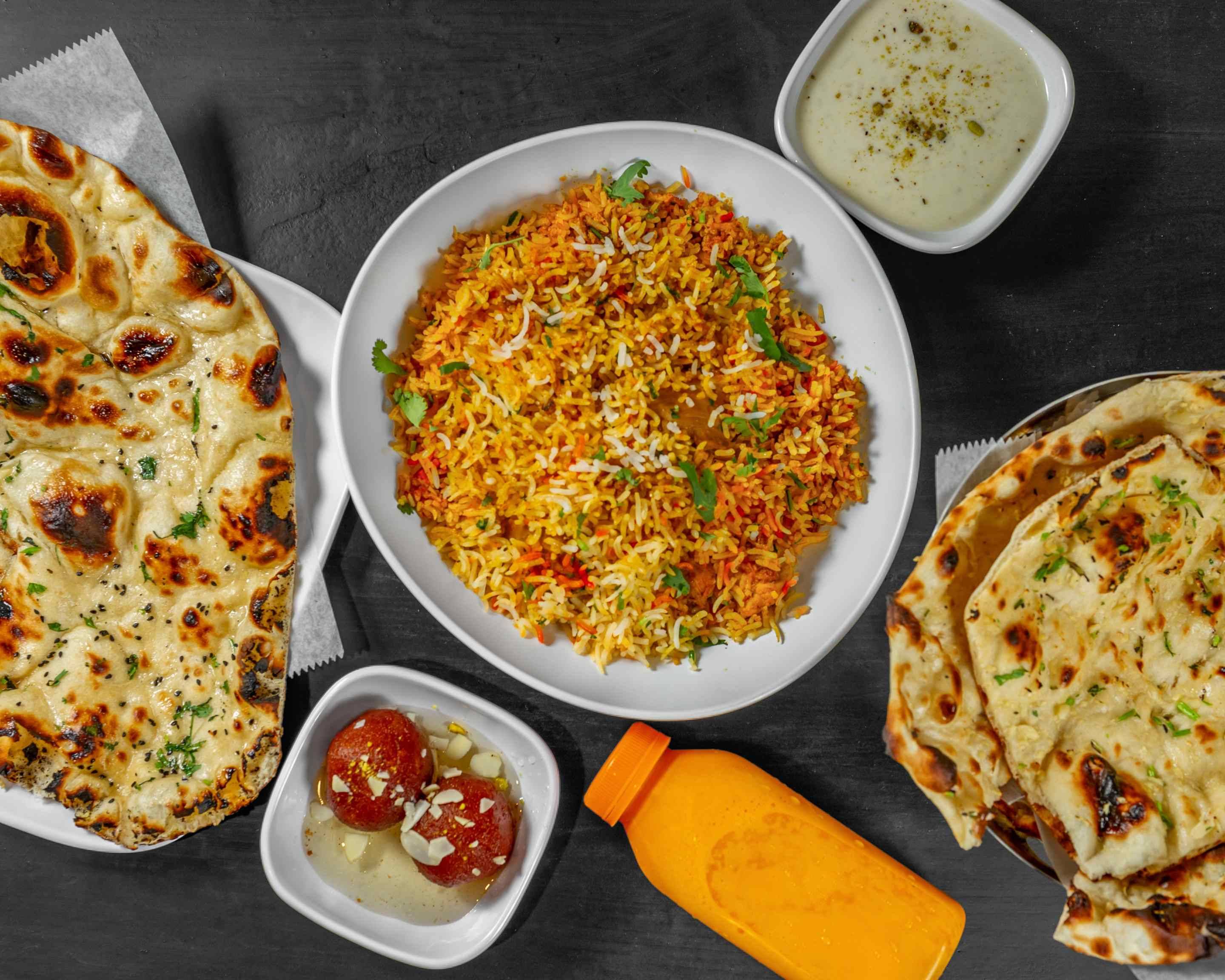 Order Qcurrys Indian Kitchen - Menu & Prices - Wheaton Delivery | Uber Eats