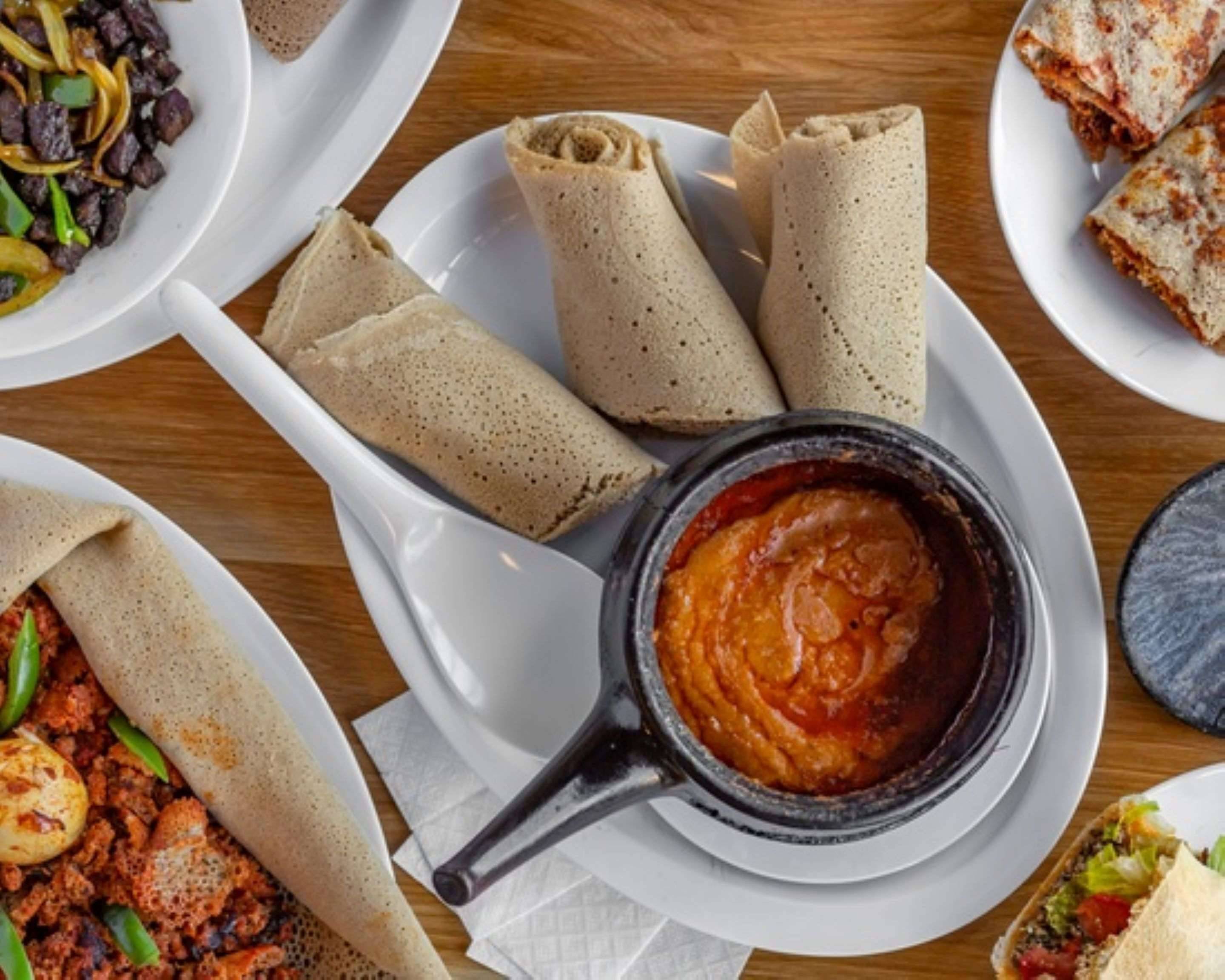 Order Betty Market and Restaurant (Gluten-free teff injera) Menu ...