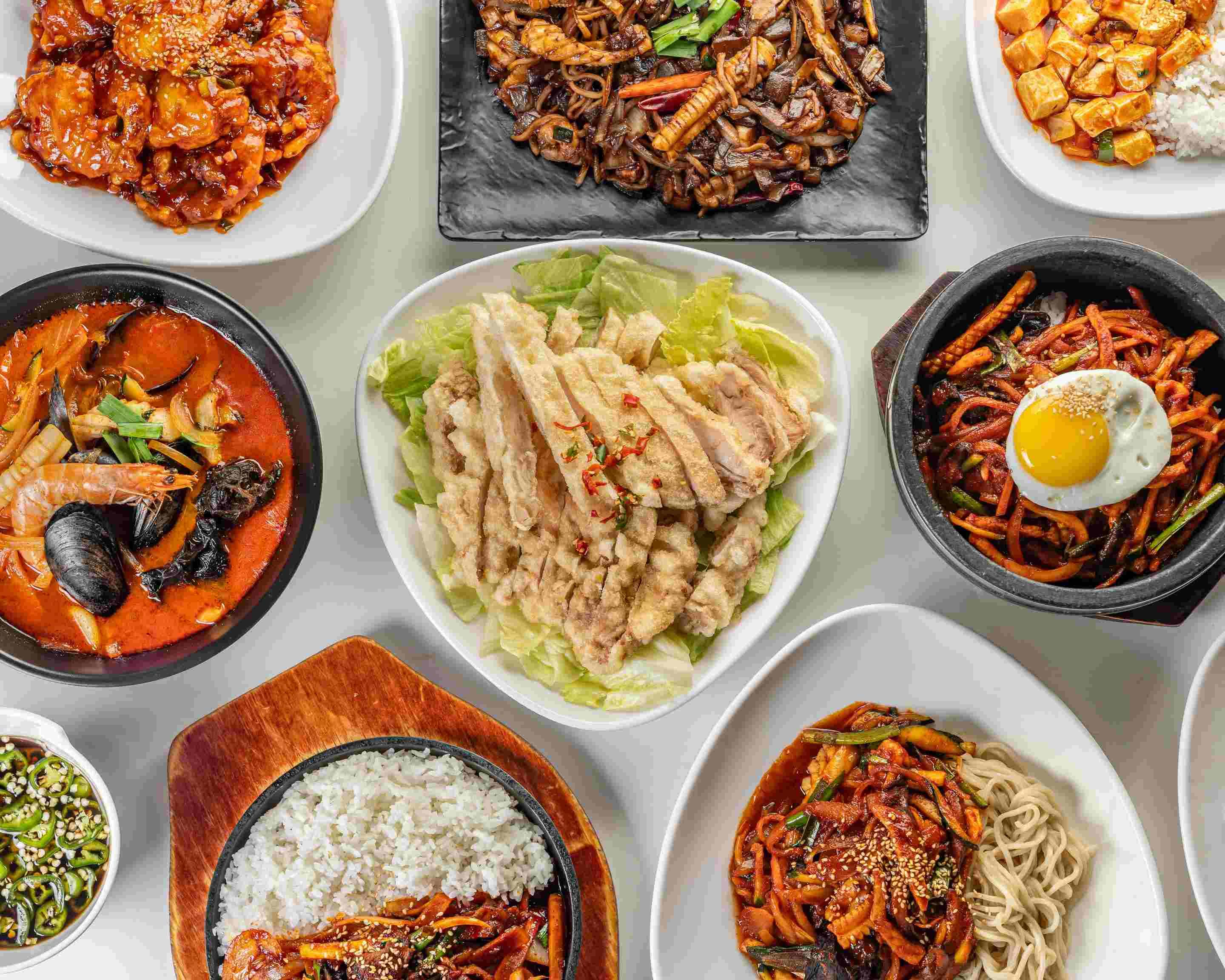 Order Sura Express - Menu & Prices - Toronto Delivery | Uber Eats