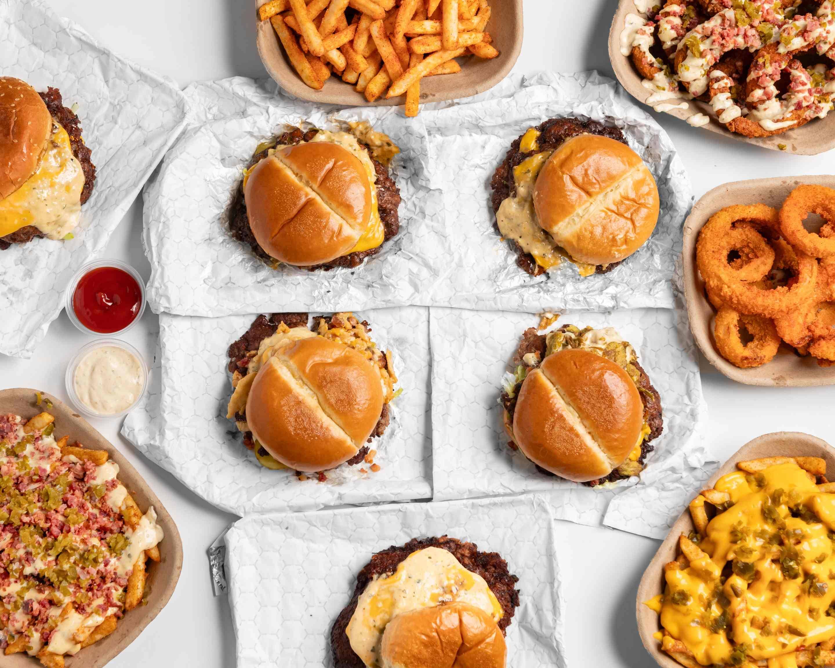 Order Between 2 Buns Burgers - Menu & Prices - Burnaby Delivery | Uber Eats